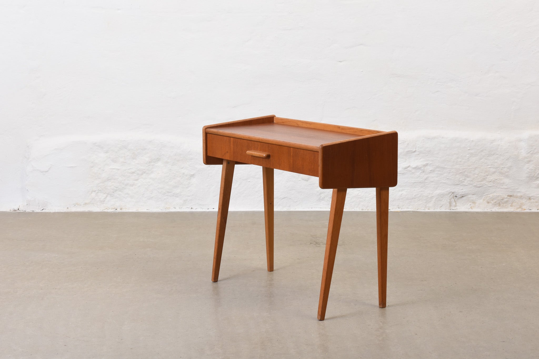 1960s teak bedside table on beech legs – CHASE & SORENSEN