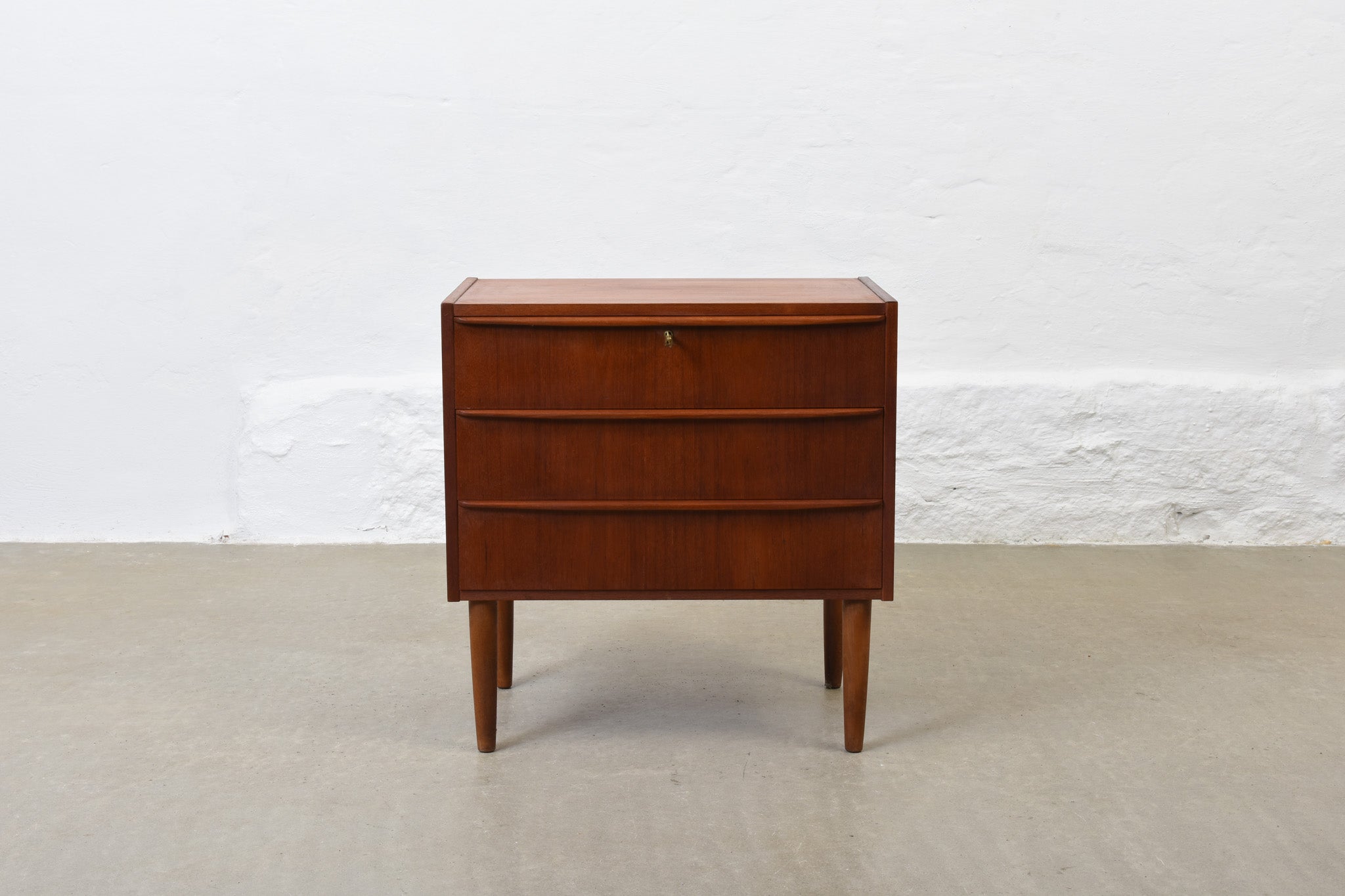 1960s low teak chest with lipped handles – CHASE & SORENSEN