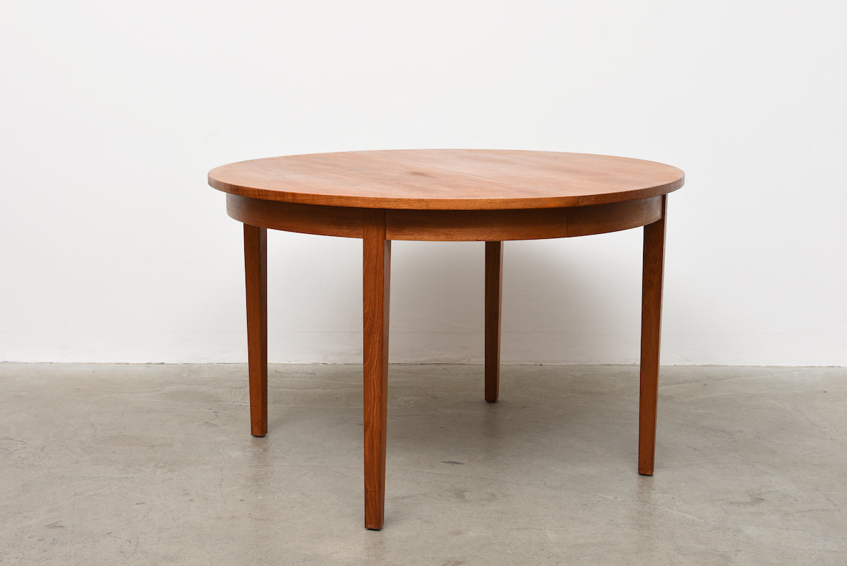 1960s round dining table in teak – CHASE & SORENSEN